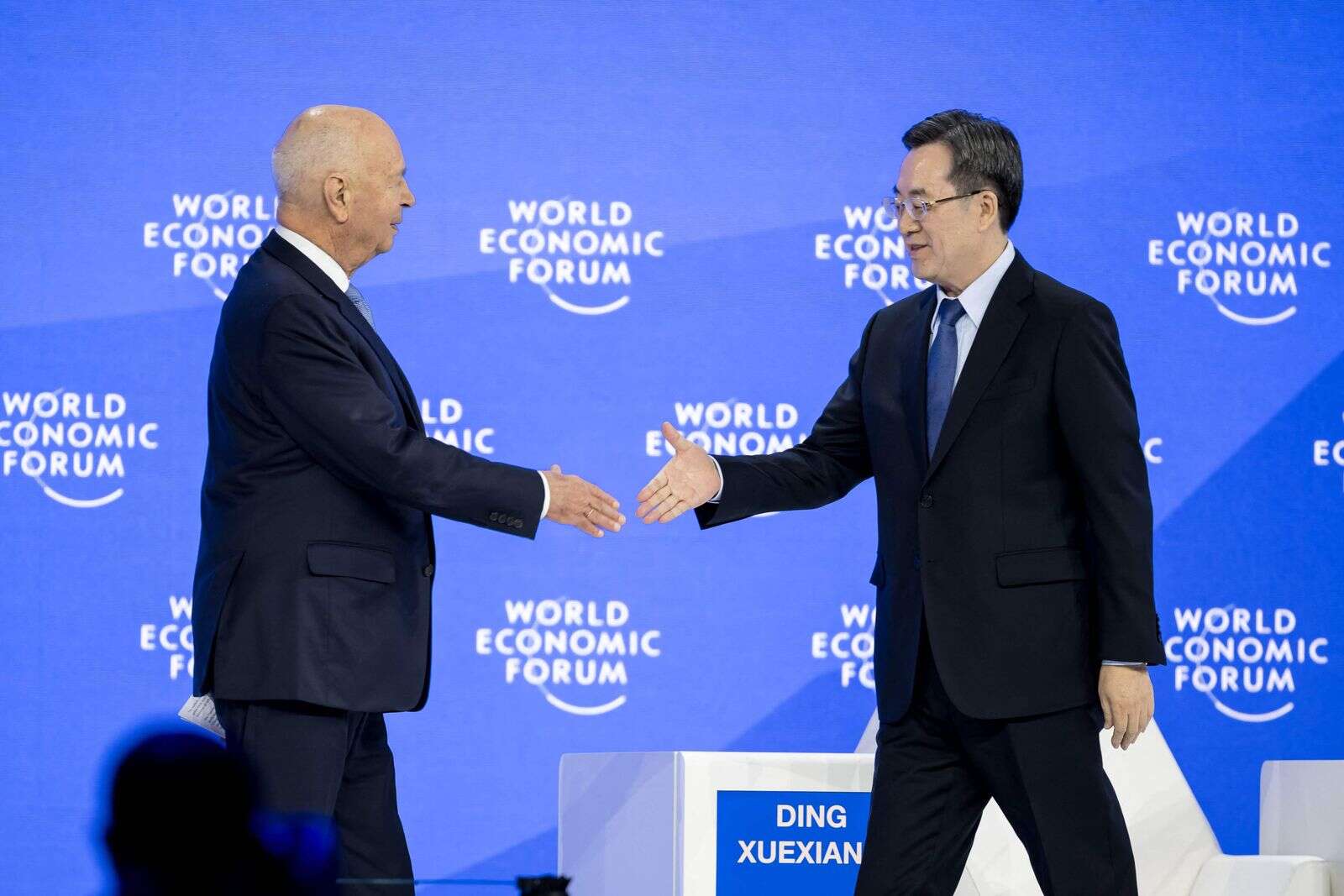 Global leaders call for action on AI, climate crisis at WEF