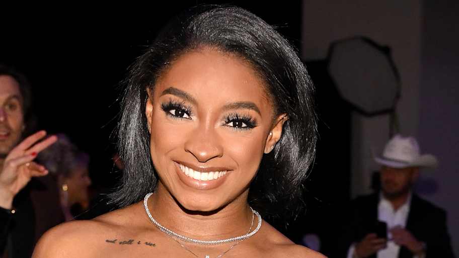 Simone Biles Nails NYC Winter Chic in Monochrome Chocolate Ensemble