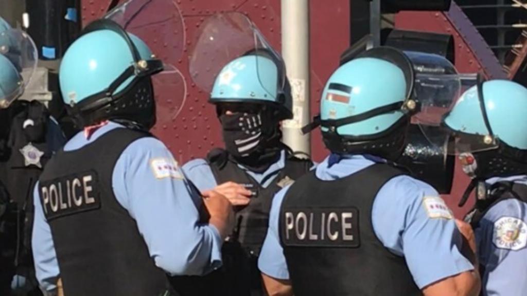 Chicago police officer faces reprimand for wearing extremist group logo ...