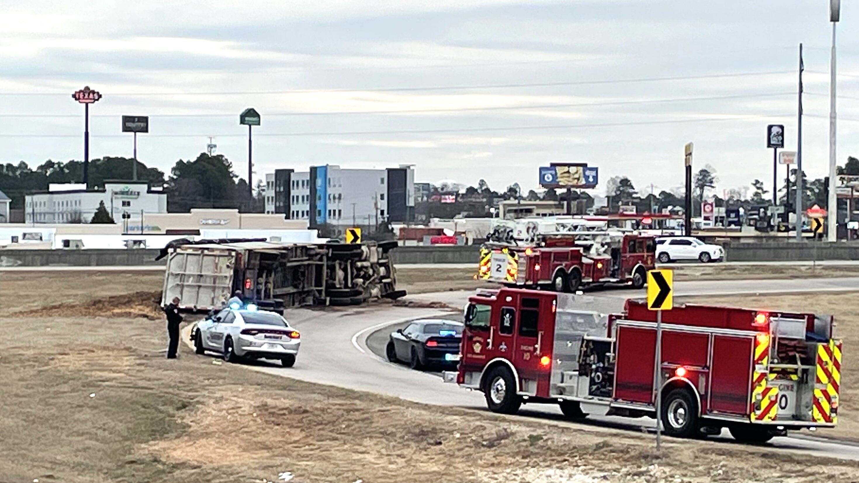 Ramp closed after big-rig tips over while getting onto I-20