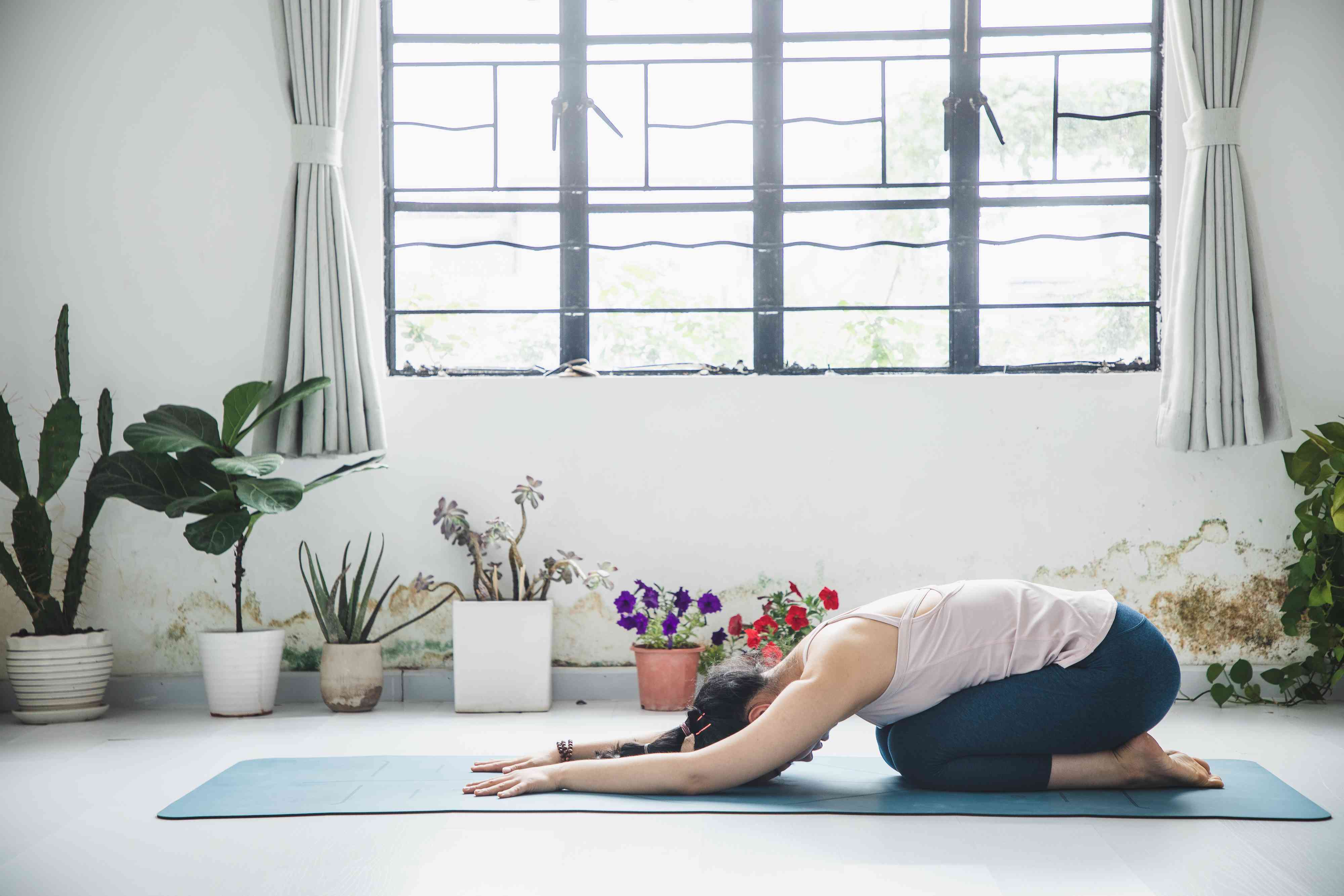 13 Restorative Yoga Poses for Rest, Healing, and Better Sleep
