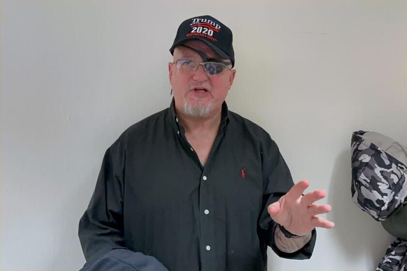 After Trump clemency order, judge bars Oath Keepers founder Rhodes from ...