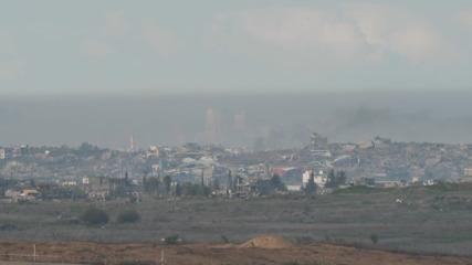 Scale of destruction highlighted by morning sun over skyline of ...