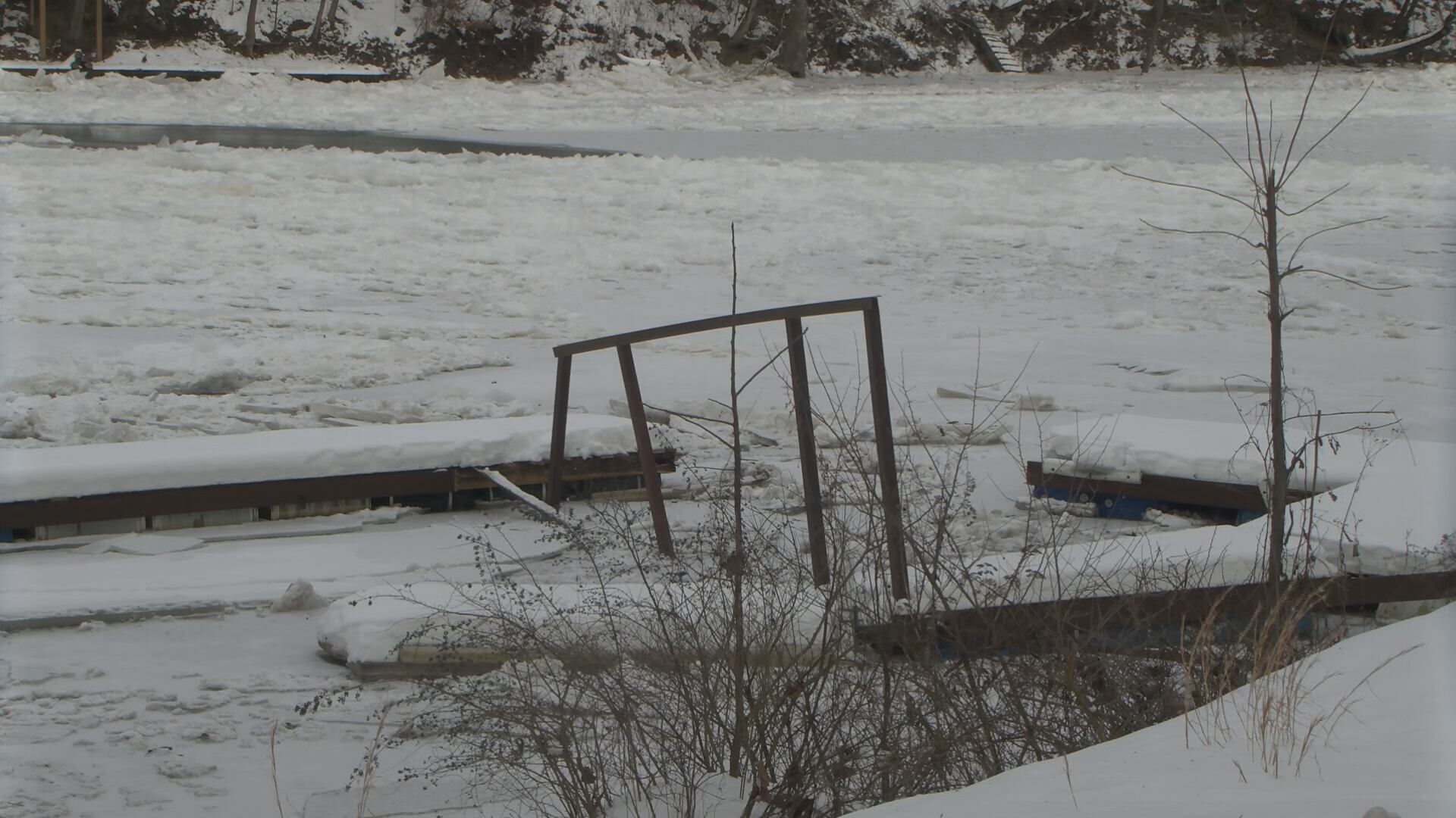Ice causes damage to docks and boats along the Tygart River