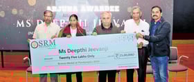 SRM-AP presents Rs 25 lakh cheque to paralympian