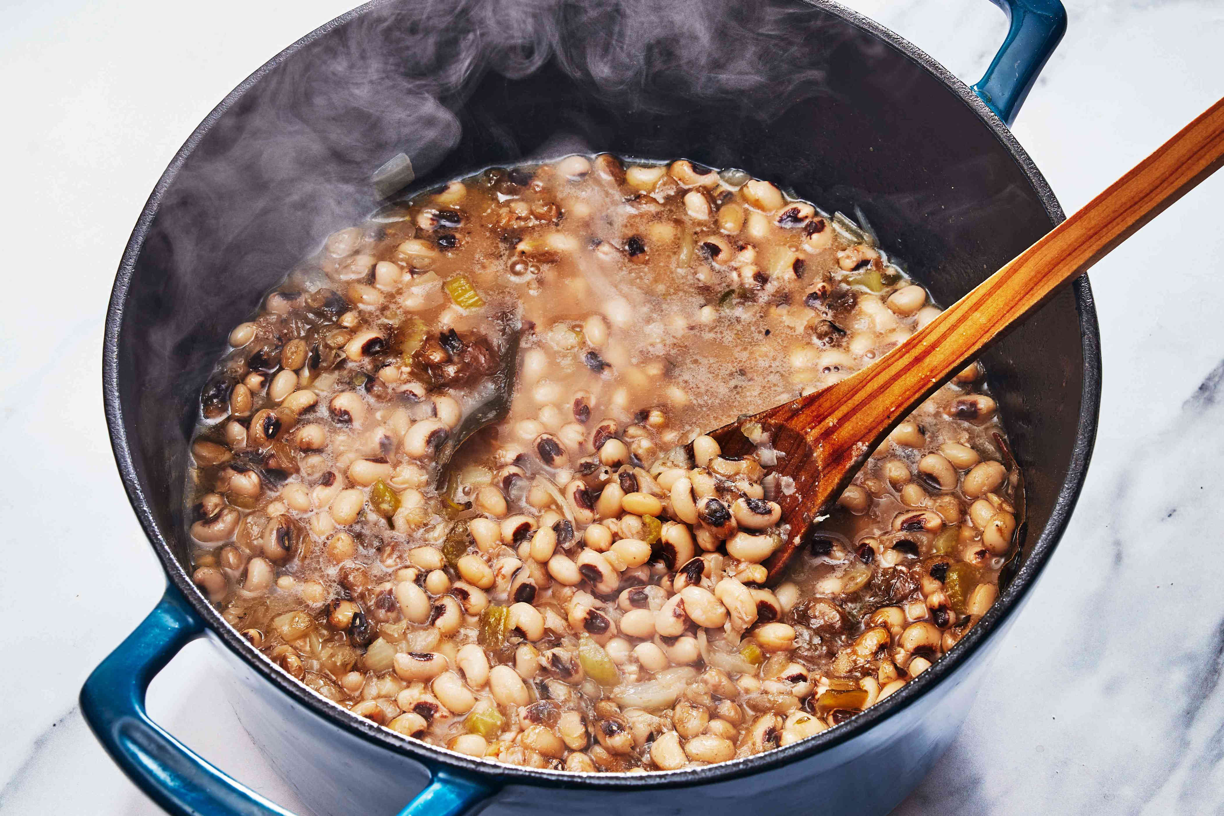 Why We're Adding This Unexpected Ingredient To Beans