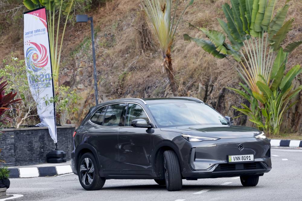 First Proton e.MAS EV showroom with charging station opened in Penang