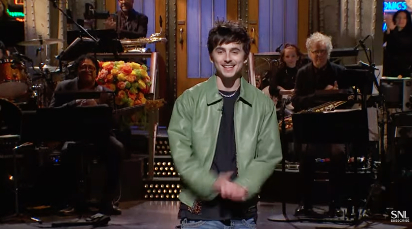 Timothée Chalamet makes fun of awards show losses, performs Bob Dylan ...