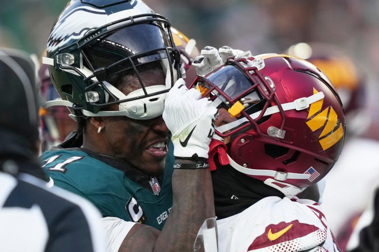 Eagles-Commanders gets chippy as Marshon Lattimore loses helmet in ...