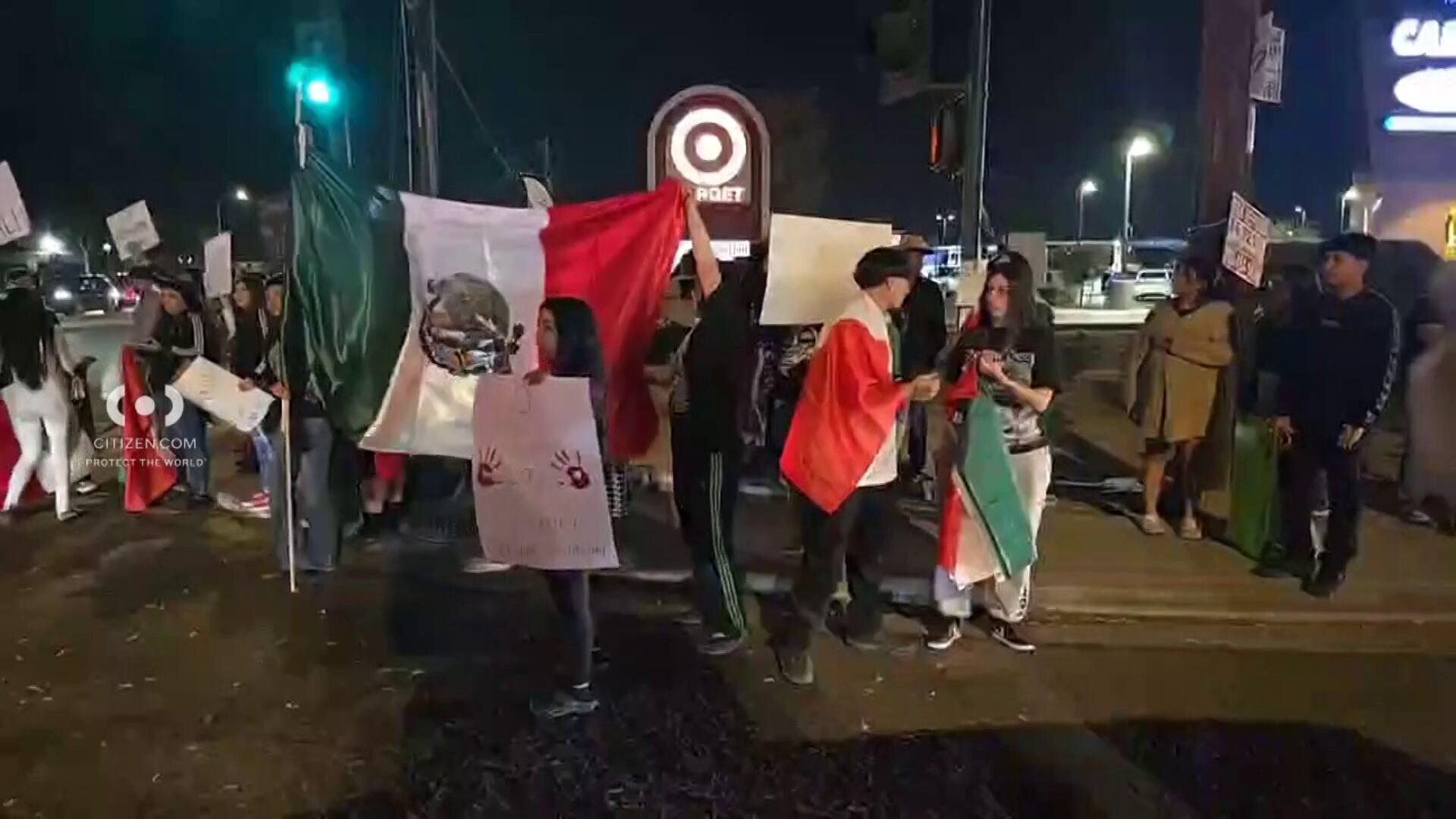 People line busy Phoenix intersection to protest Trump’s immigration ...