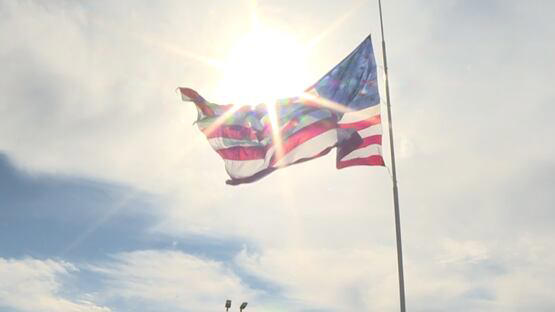 Camping World and residents react to city council vote on giant flag in ...