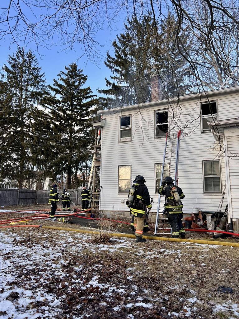 Crews remove person from house fire in Ansonia