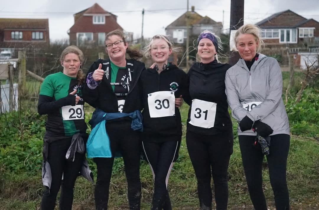 Trail runners battered by Storm Eowyn at Winchelsea Beach