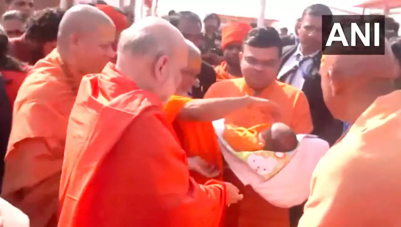 Jay Shah's newborn blessed by priests in Prayagraj during Maha Kumbh ...