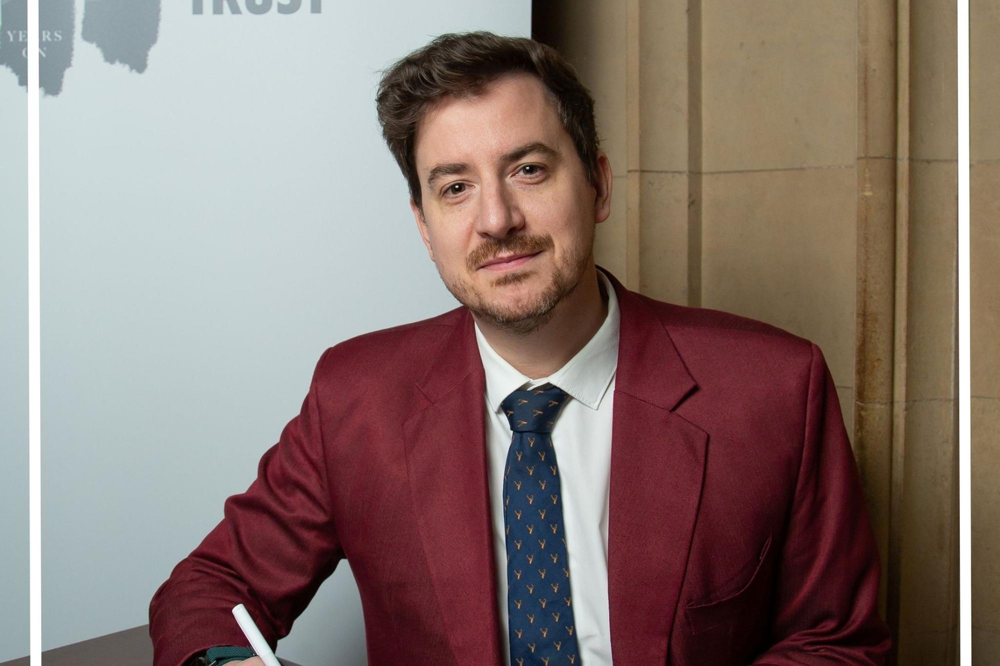 Mike Reader MP signs Holocaust Educational Trust Book of Commitment