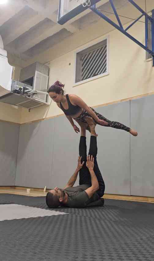Impressive Acro Yoga Routine in a Gym Setting