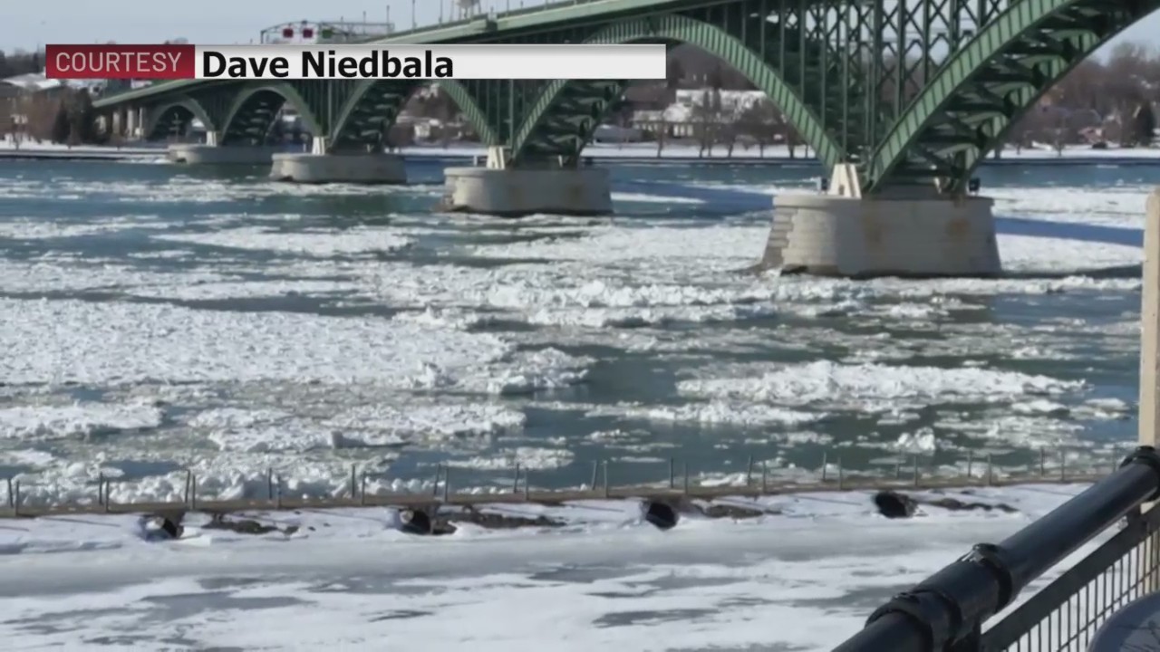 Ice sheets flow over Buffalo's ice boom into Niagara River