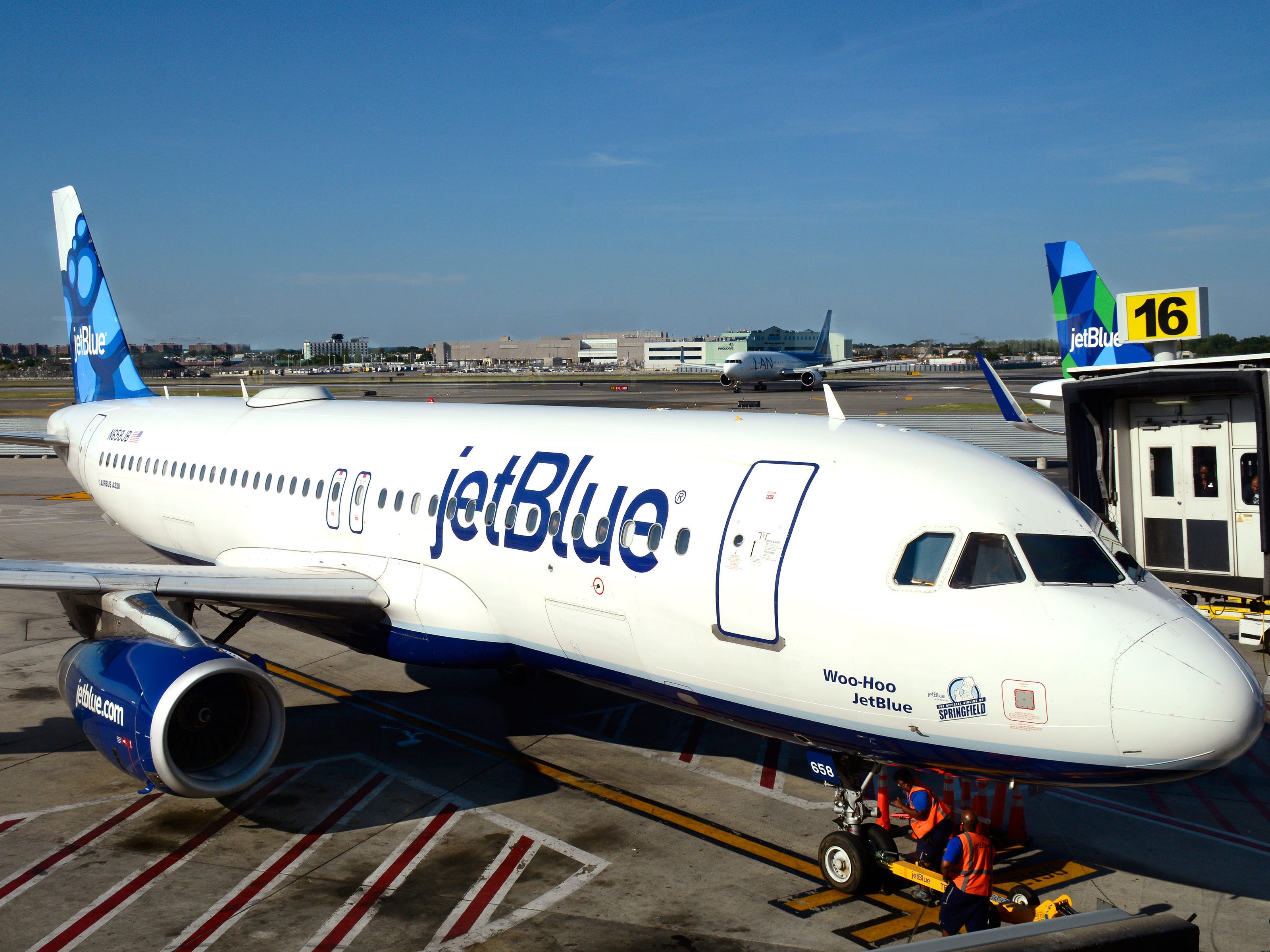 A JetBlue passenger opened the plane's emergency exit after reportedly ...