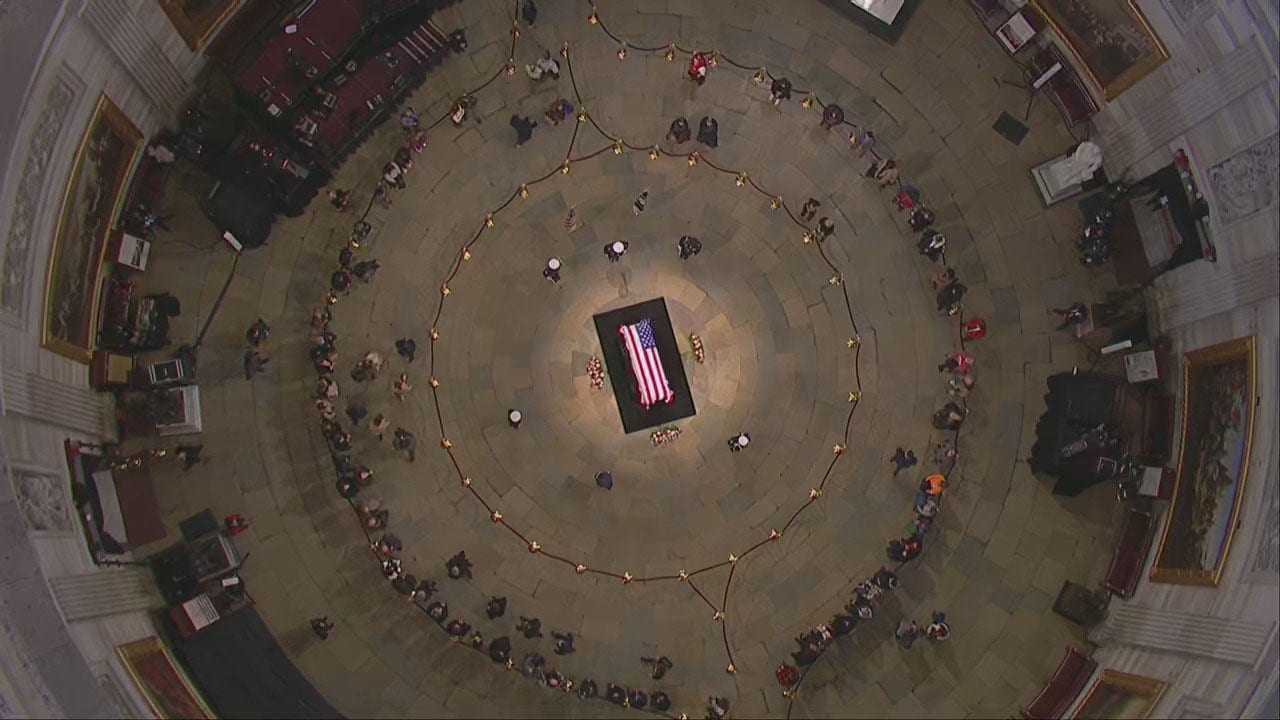 Mourners brave cold to pay respects to Jimmy Carter at Capitol Rotunda ...