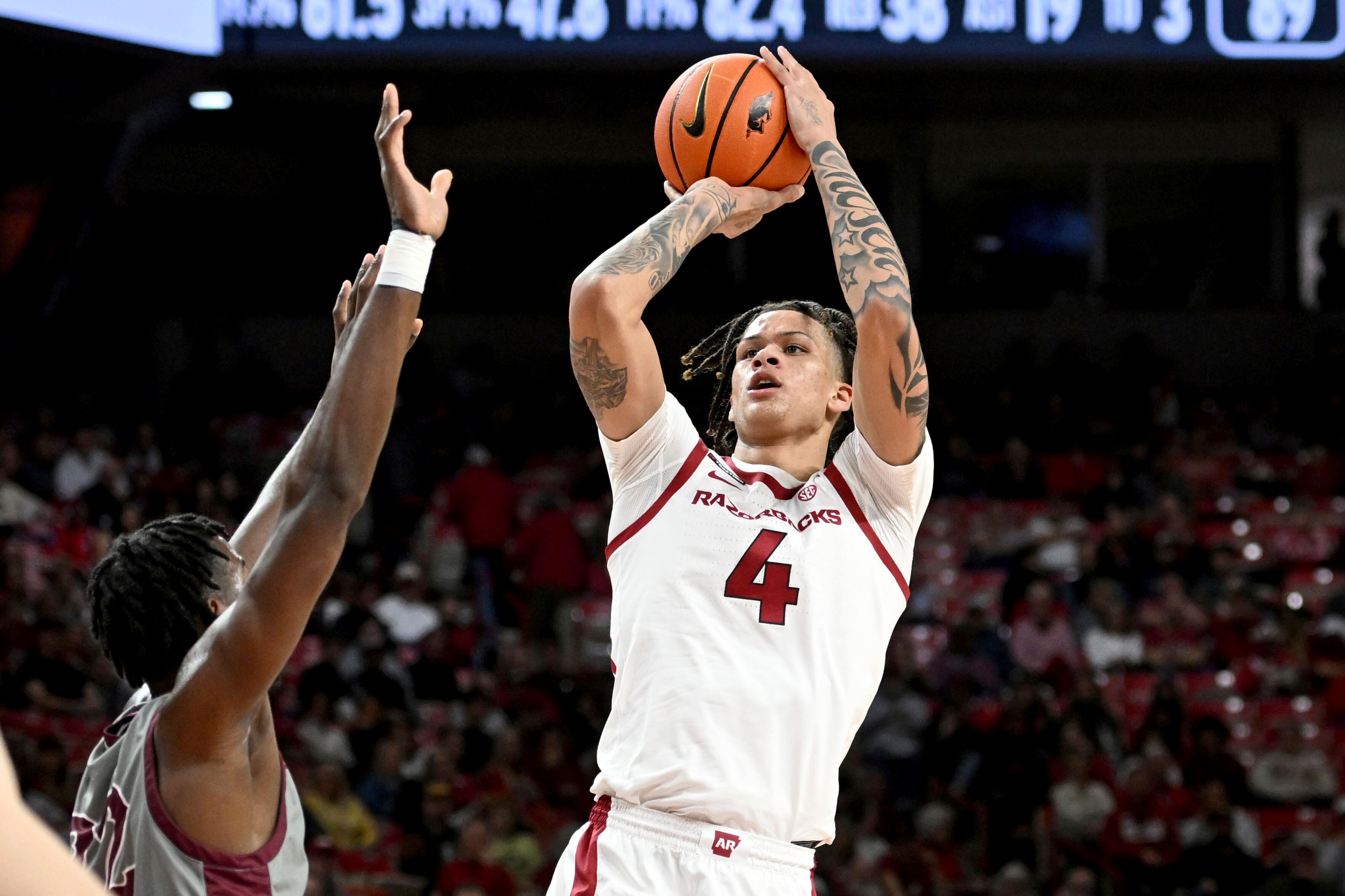 NCAA TOURNAMENT: Arkansas Razorbacks square off against the Kansas ...