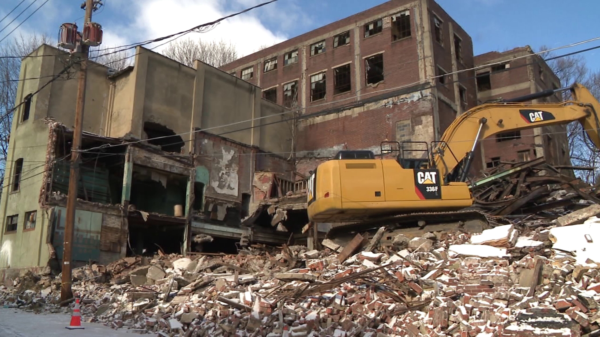 Demolition underway on former Martin Shirt Company building in ...