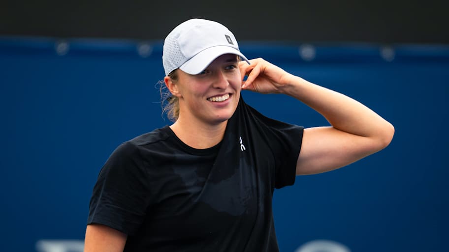 Iga Swiatek Debuts "Creamsicle" Outfit for Australian Open