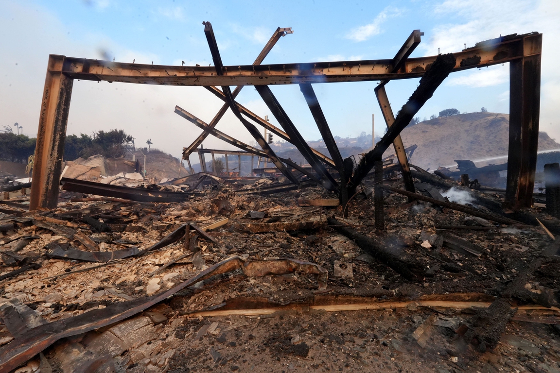Shocking photos show wildfires descending on edges of LA