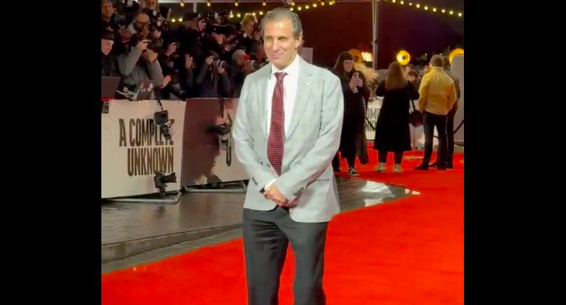 Chris Russo walks red carpet at movie premiere