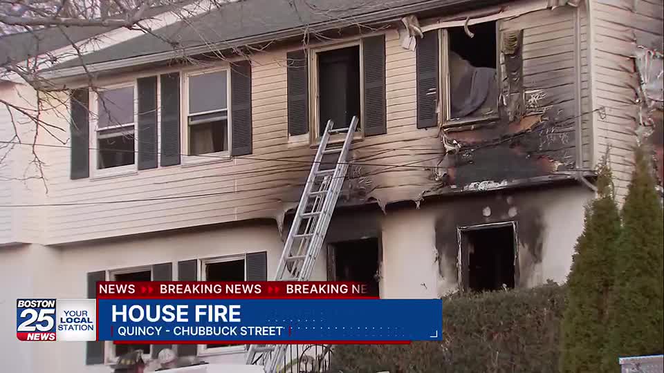 Firefighters battle flames, clutter in Quincy house fire that displaced 9