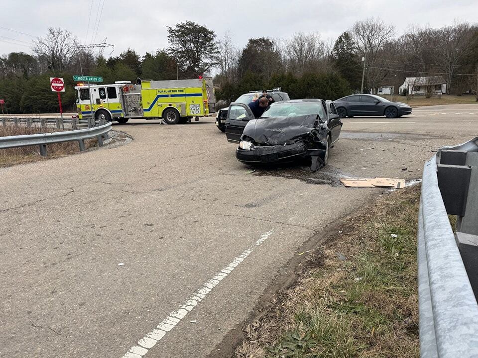 Crews use extrication tools after person trapped after crash on ...