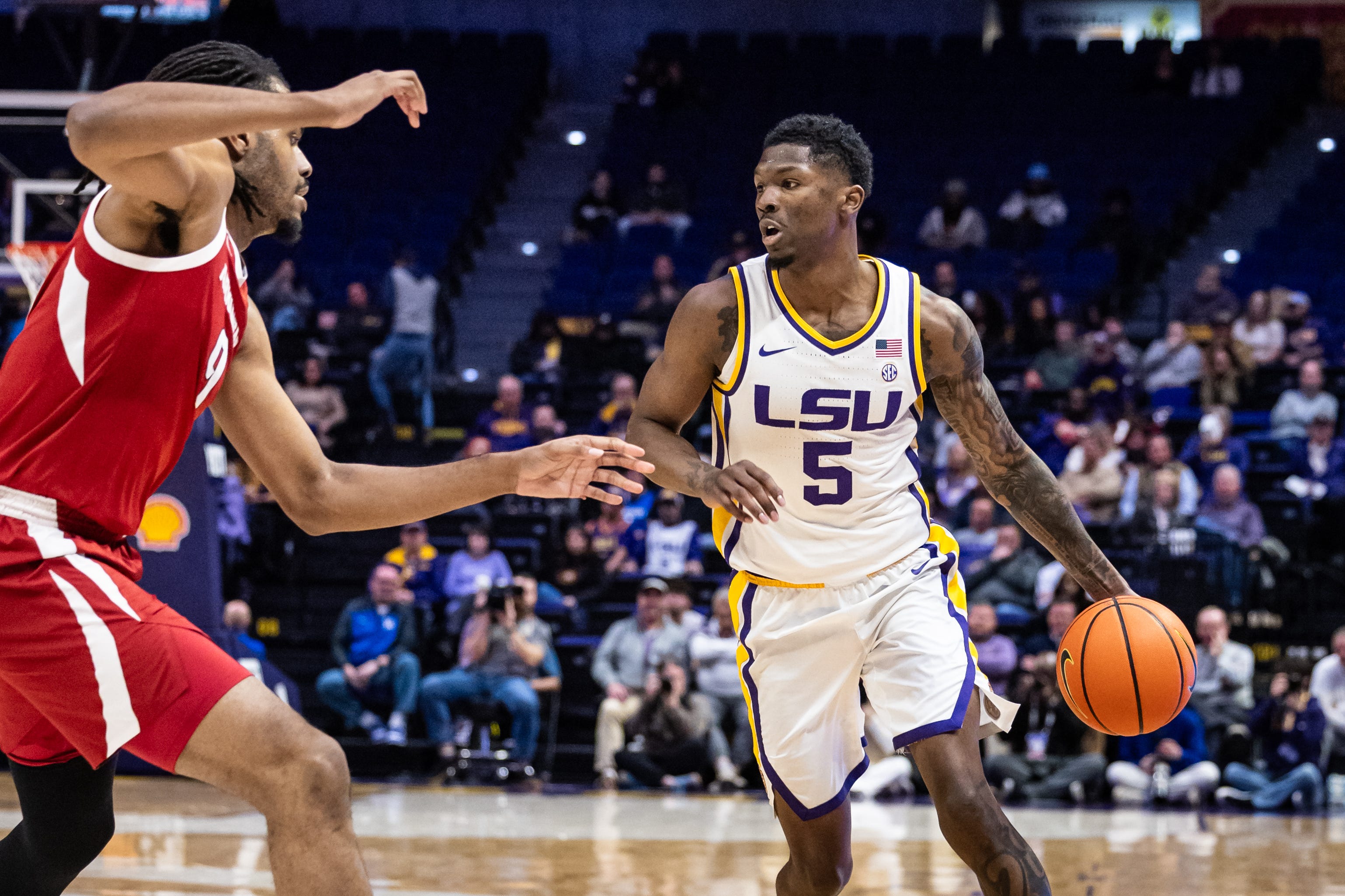LSU basketball holds off comeback bid, shocks Arkansas for first SEC ...