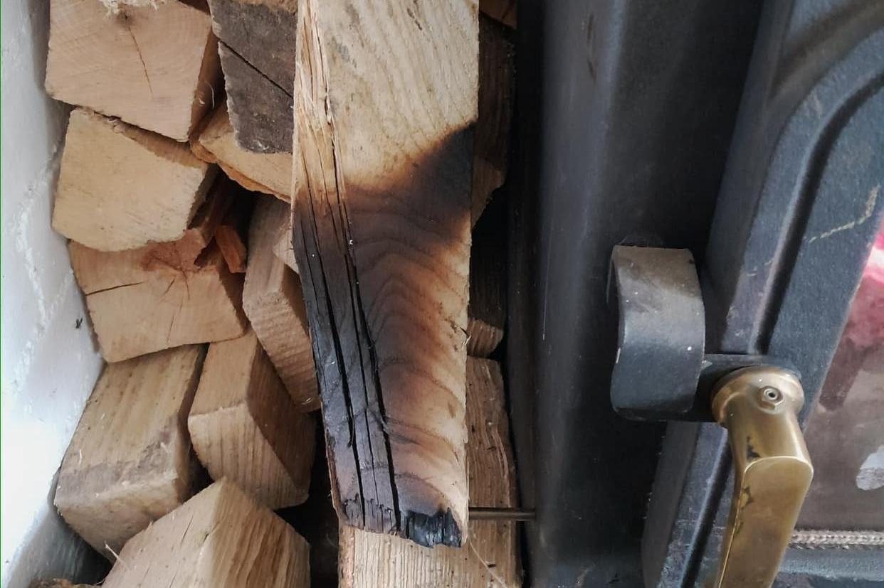 Firefighters tackle house fire near Boston after dried wood near log ...
