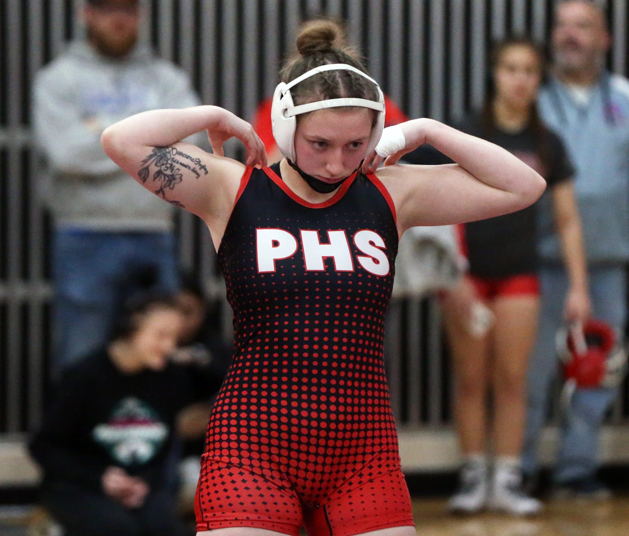 The message on this Plymouth girls wrestler's arm that is fueling her ...