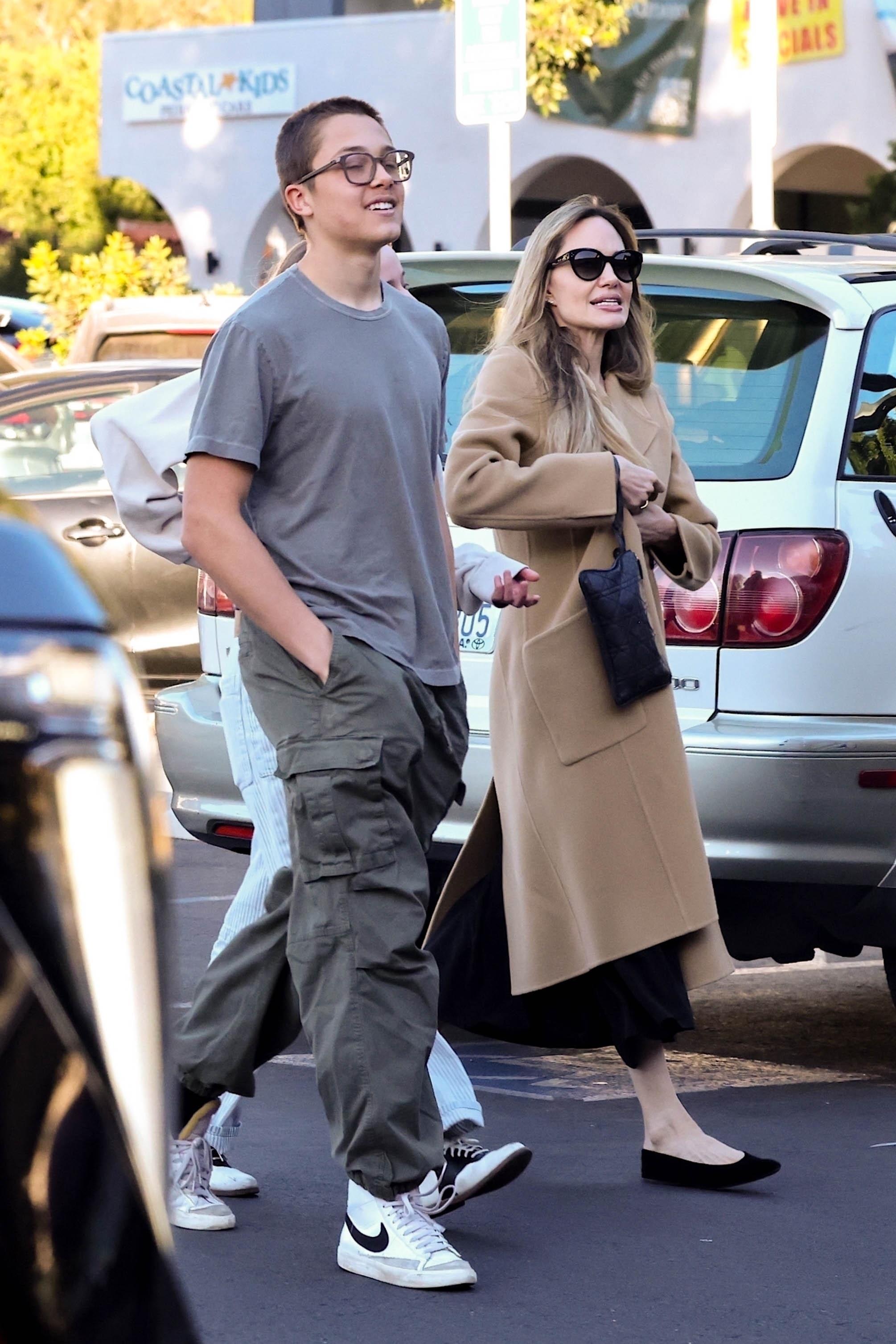 Angelina Jolie’s son Knox, 16, towers over actress on grocery run with ...