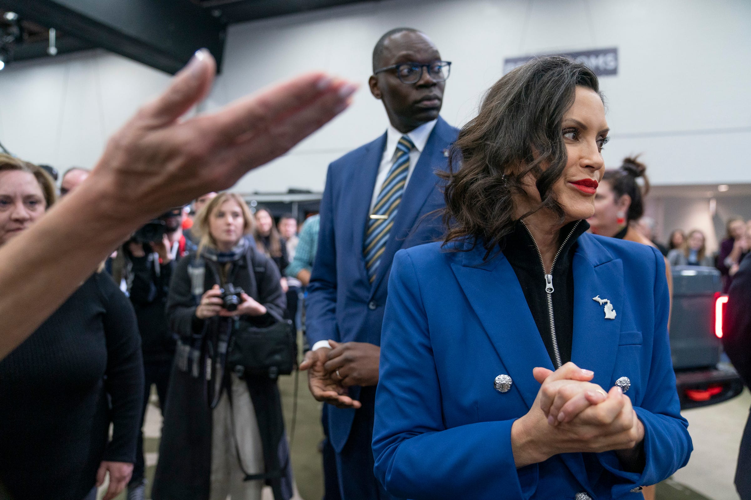 Gov. Whitmer signs Michigan tipped minimum wage, paid sick leave bills ...