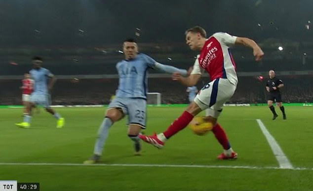 Arsenal score controversial equaliser in north London derby - as ...