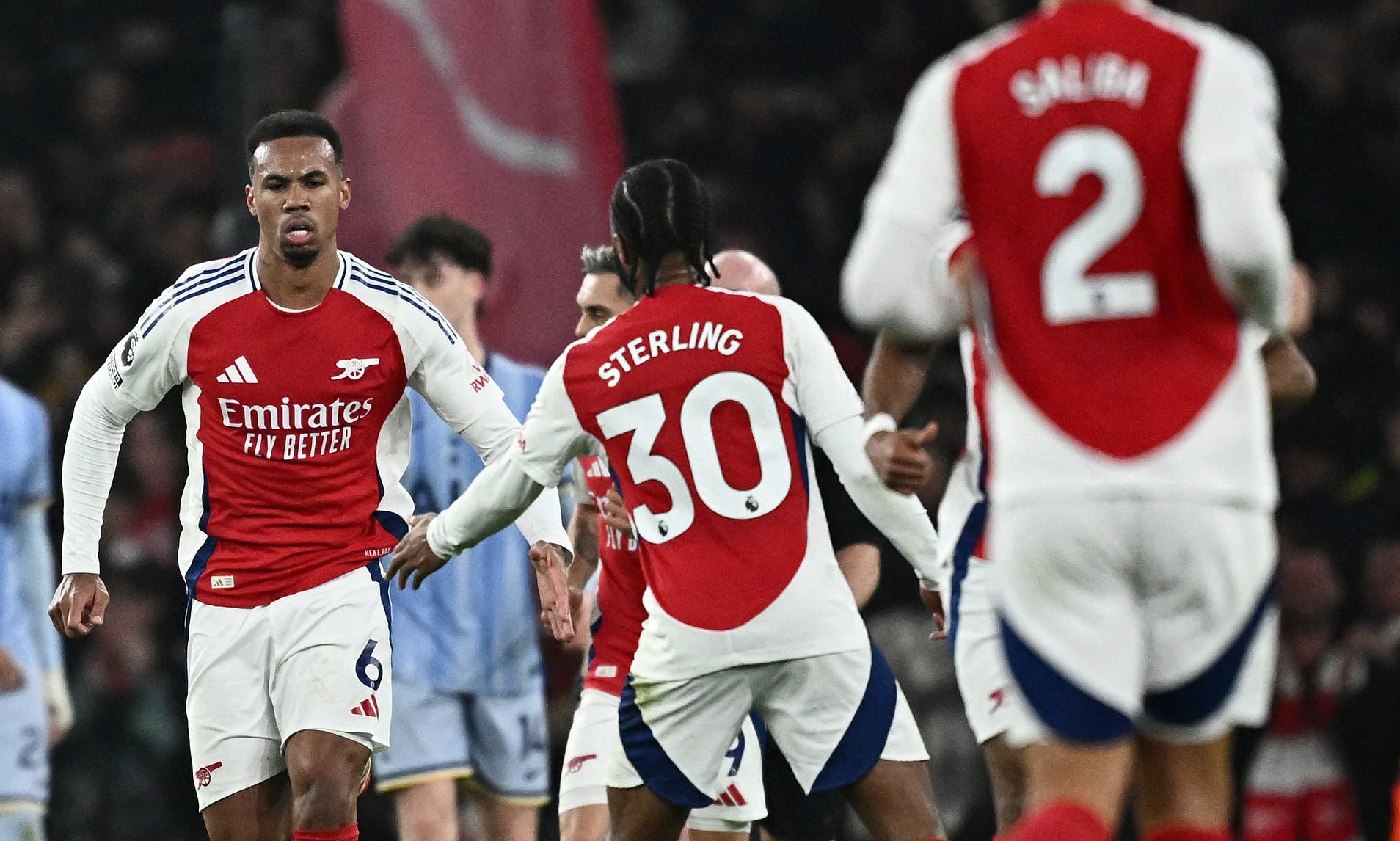 Arsenal score controversial equaliser in north London derby - as ...