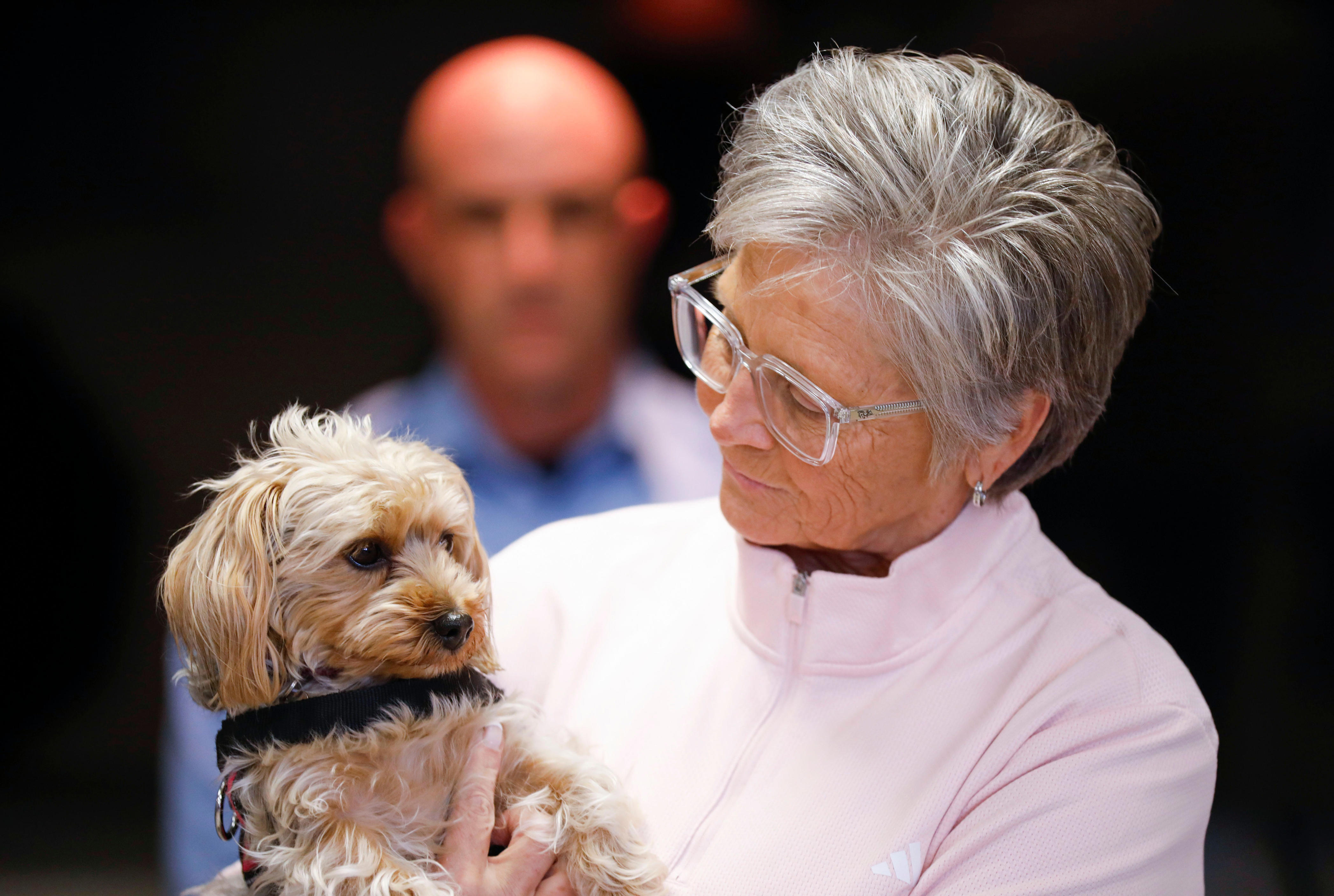 Watch the dramatic rescue of a dog owner and her precious pup from an ...