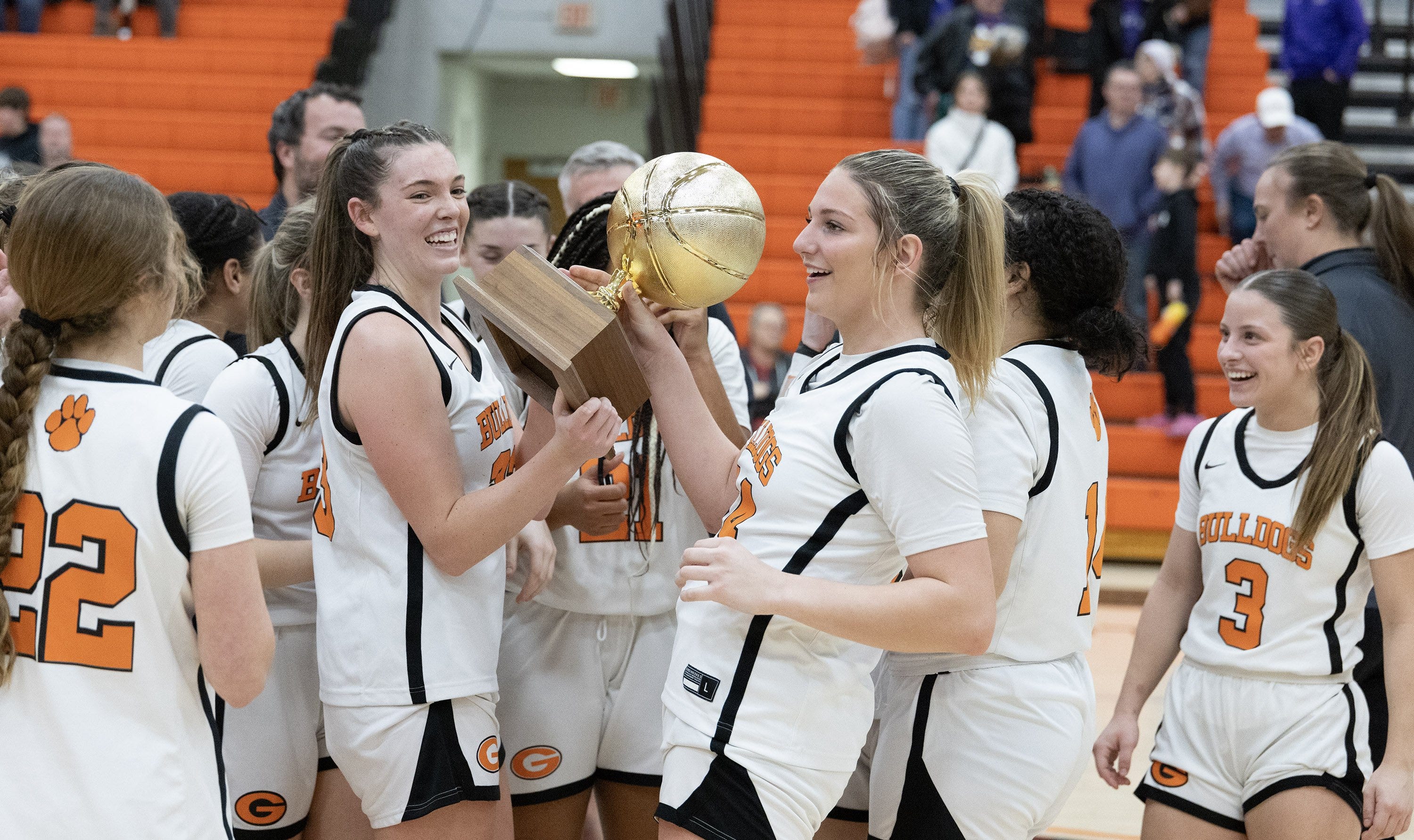 'One step to our goal': Green girls basketball team clinches share of ...