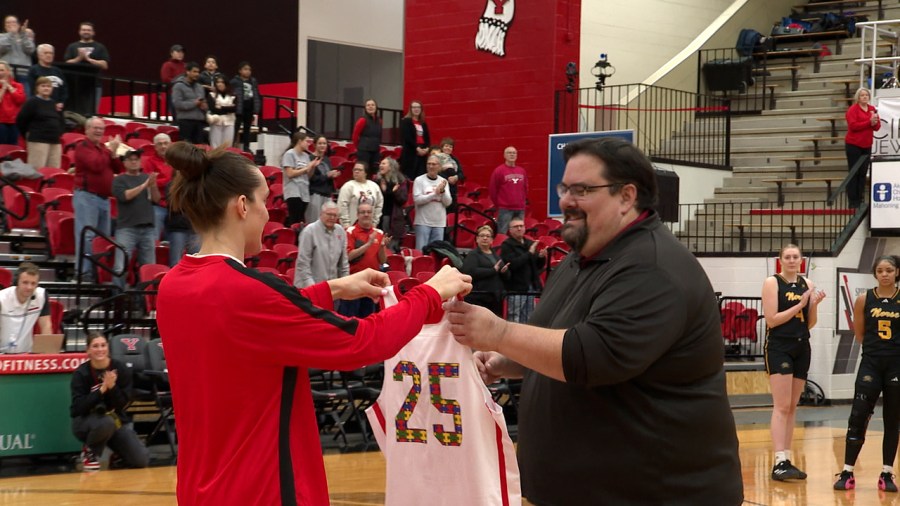 Director of The Rich Center for Autism honored at YSU basketball game