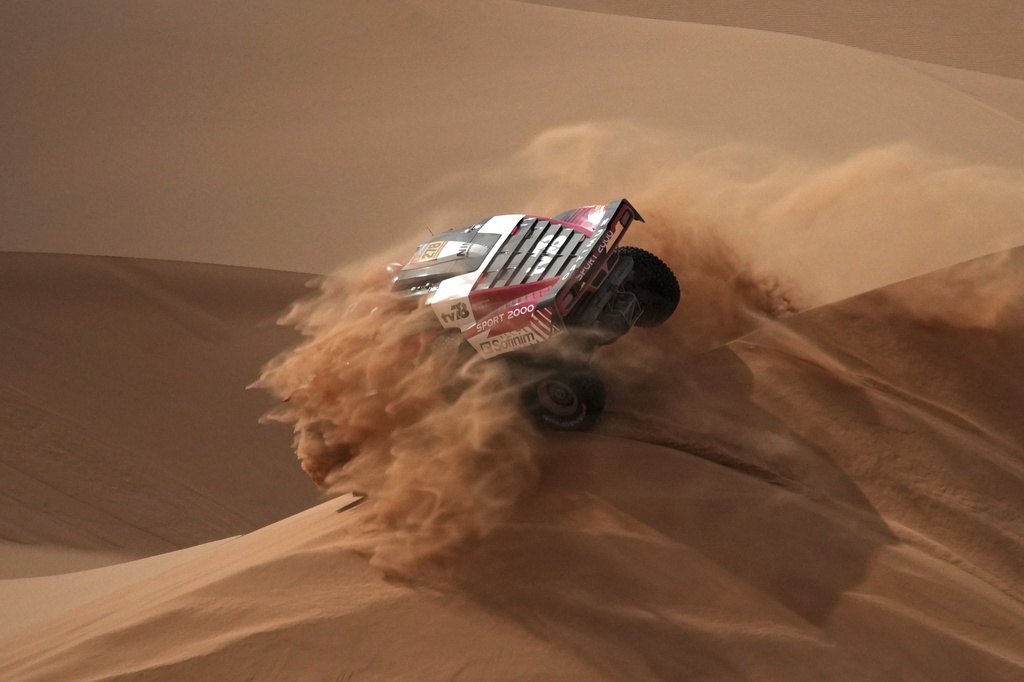Dakar Rally in pictures: AP photos show the speed and scenery as ...