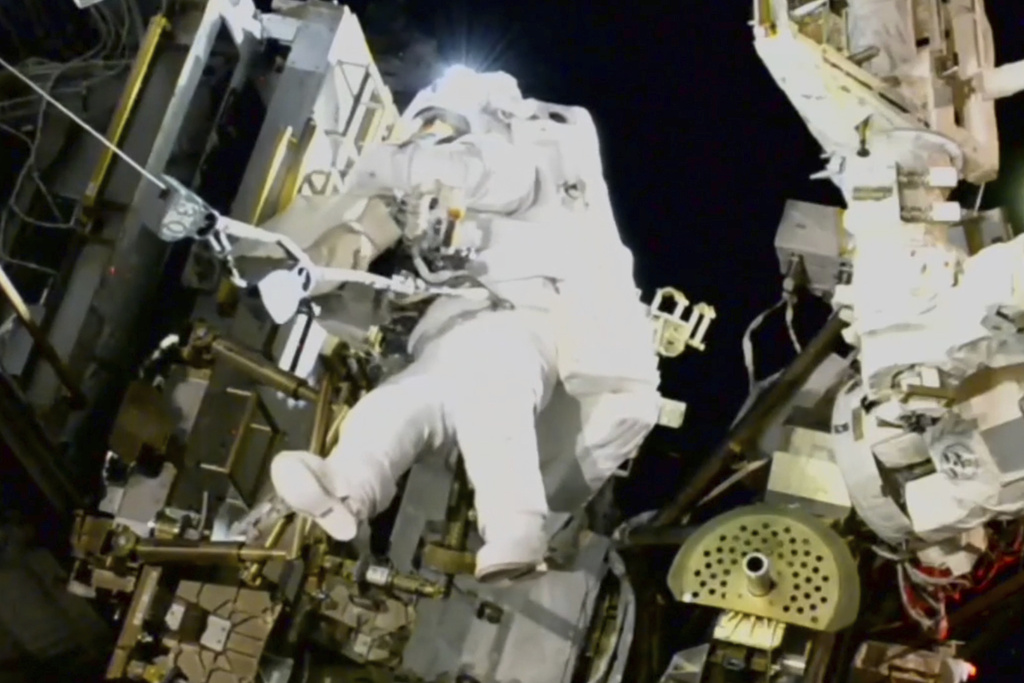 NASA's stuck astronaut steps out on a spacewalk after 7 months in orbit