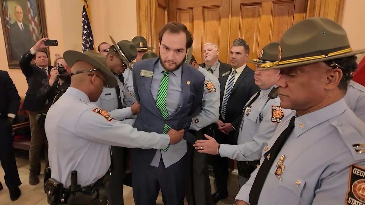 Georgia Sen. Moore defies ban, receives warm welcome post-arrest