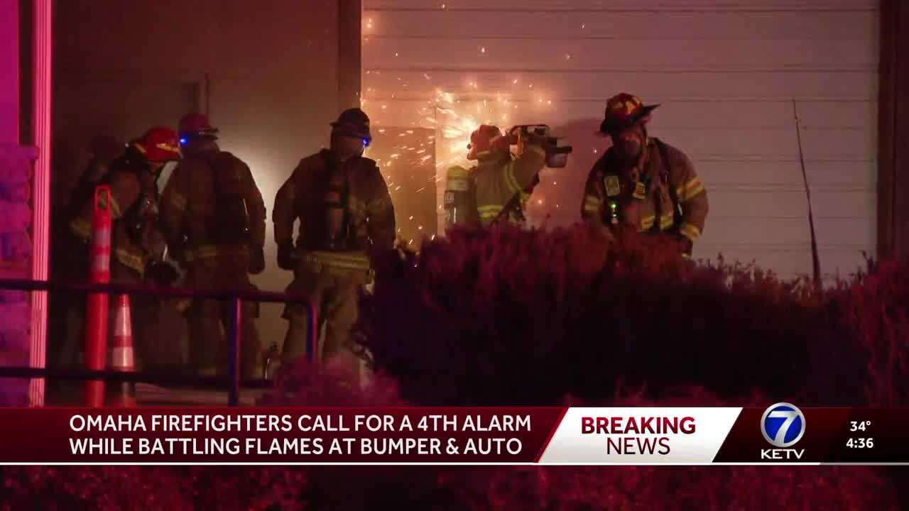 Omaha firefighters call for 4th alarm while battling auto shop fire