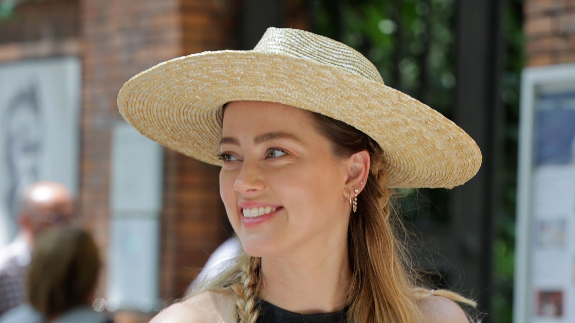 Amber Heard, expecting her second child, shares her love of Madrid in ...