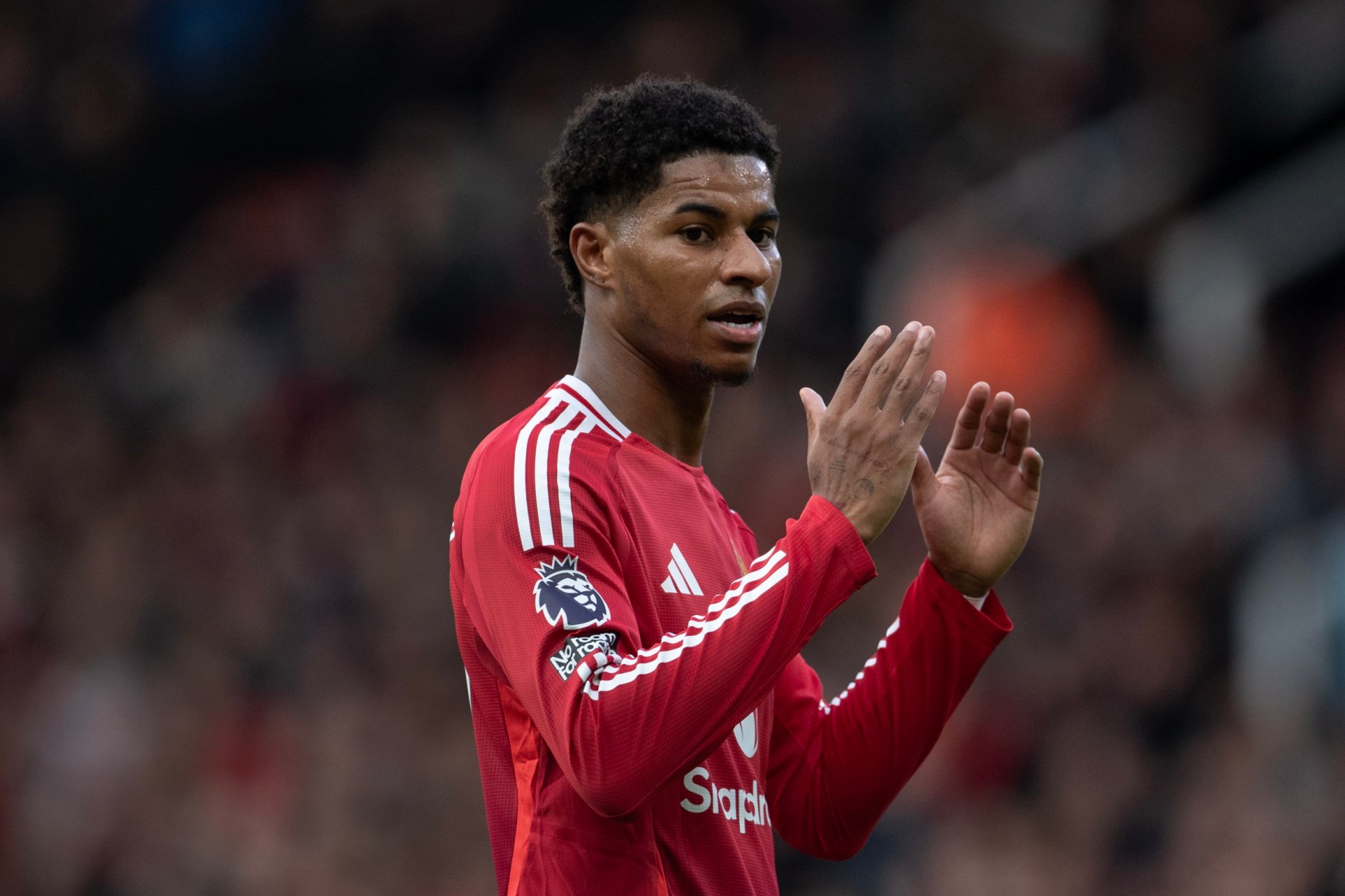 Marcus Rashford issues statement over 'tabloid photo' with rapper