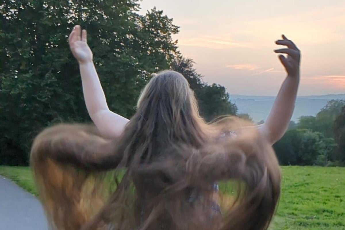 Woman with Rapunzel-style locks gets world record for longest hair donation