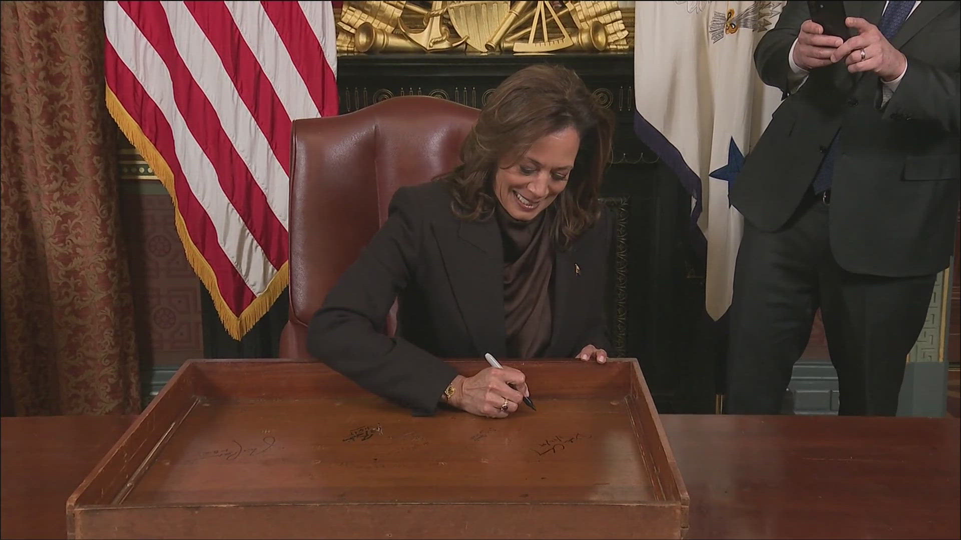 VP Kamala Harris becomes first woman to sign desk top drawer in Vice ...
