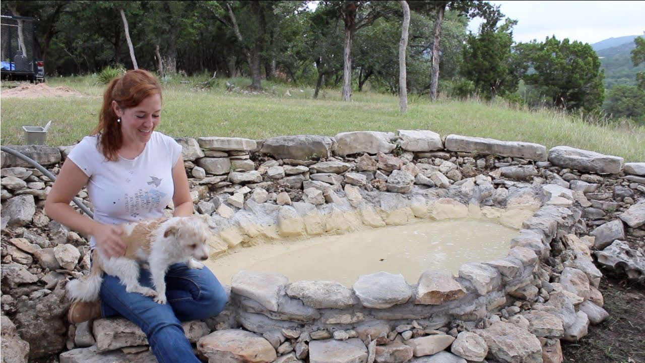 Build a dog pool using stone and mortar