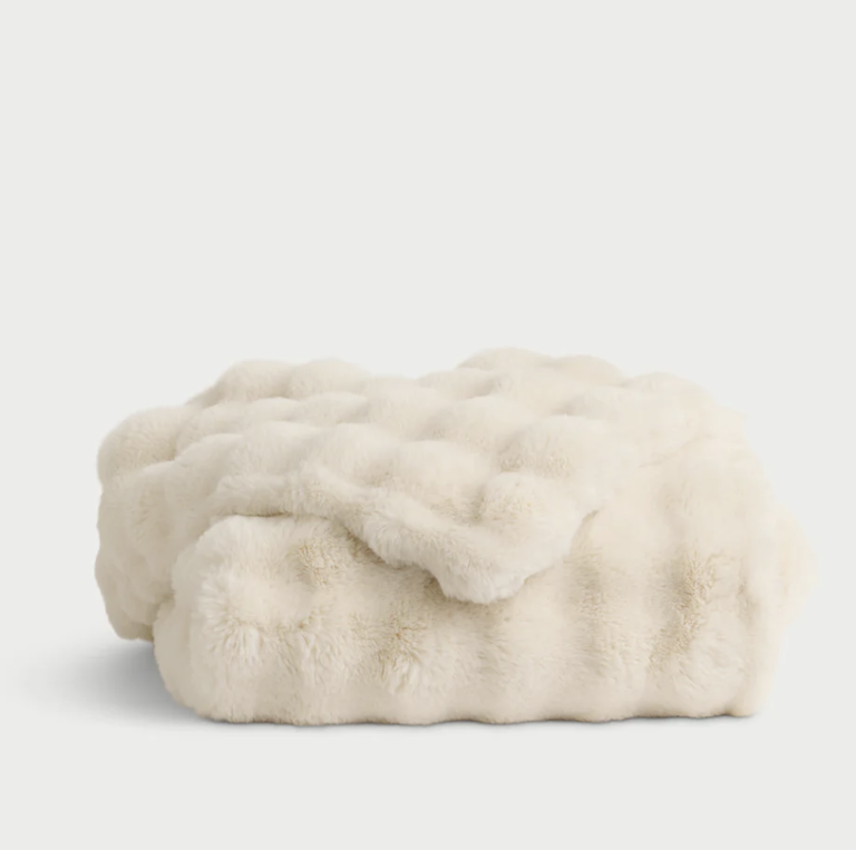 Cozy Earth's Incredibly Soft Cuddle Blanket Is Back in Stock and on Rare Sale